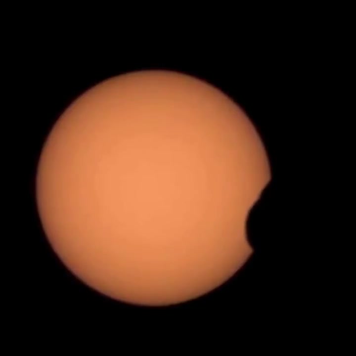 Check out this incredible video of a partial solar eclipse on Mars ...
